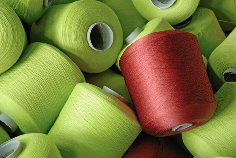 Making textiles and clothing from recycled plastics